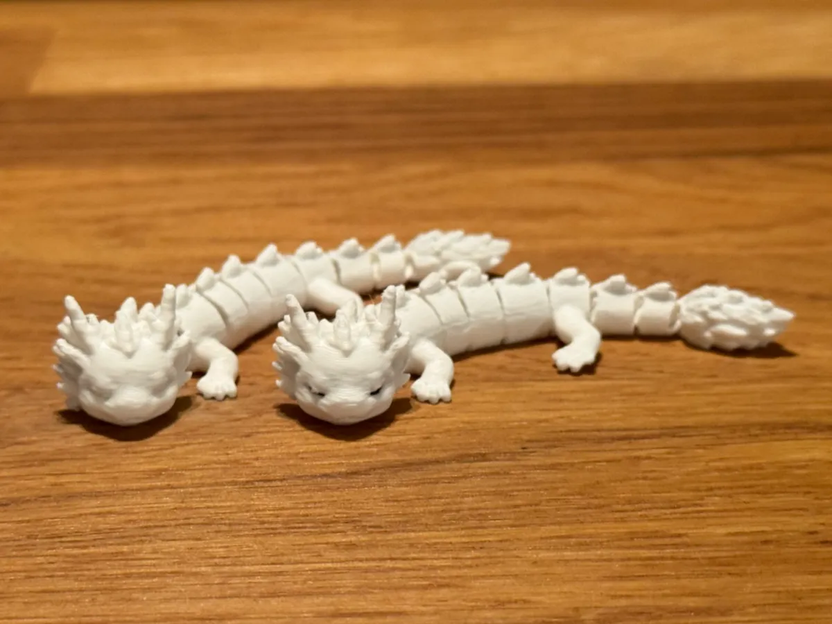 Flexi Dragon / Baby Dragon / sleeping - Free 3D Print Model - MakerWorld