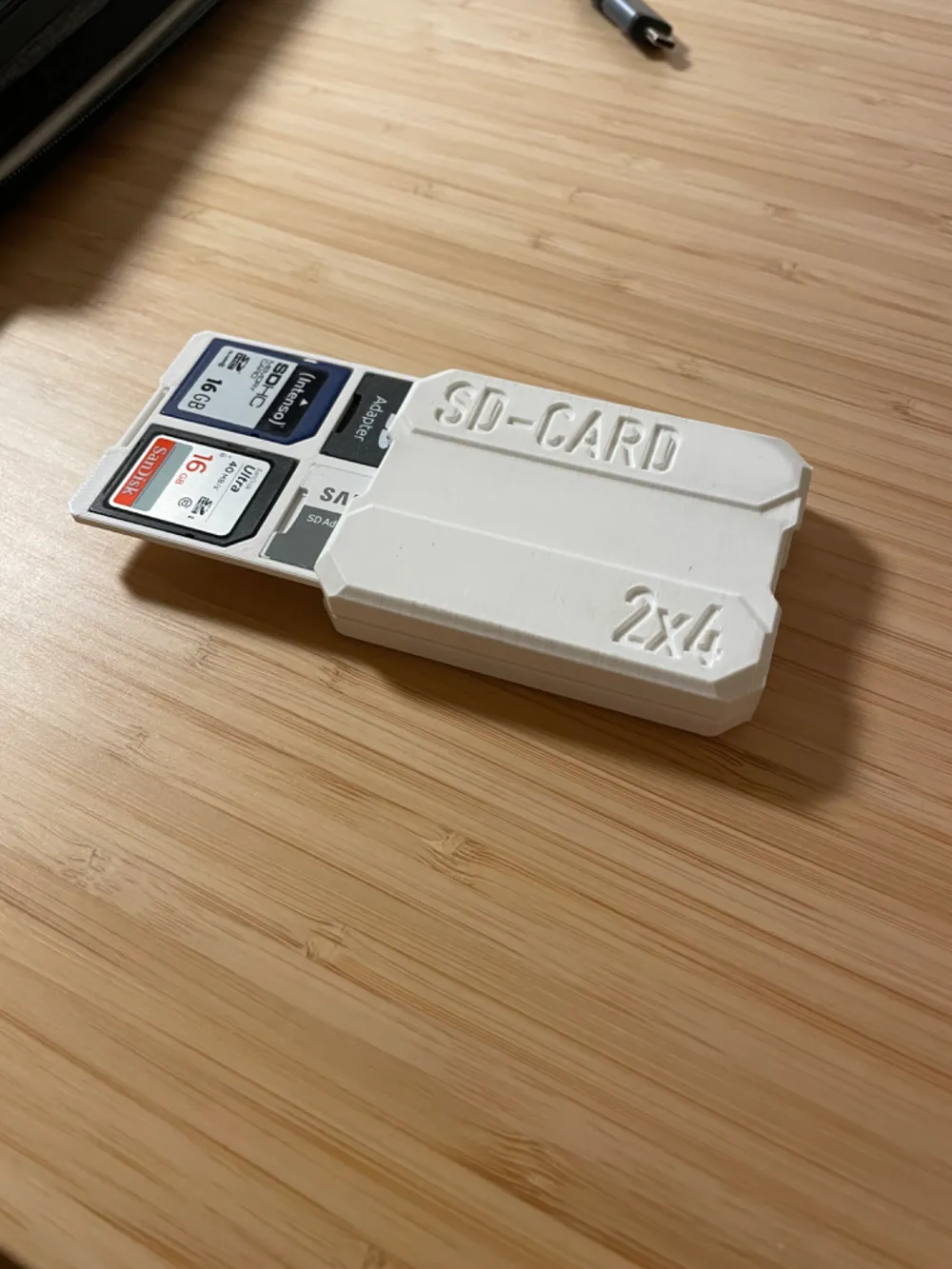 minimalistic maybe futuristic SD Card holder by Jamjampi MakerWorld ...