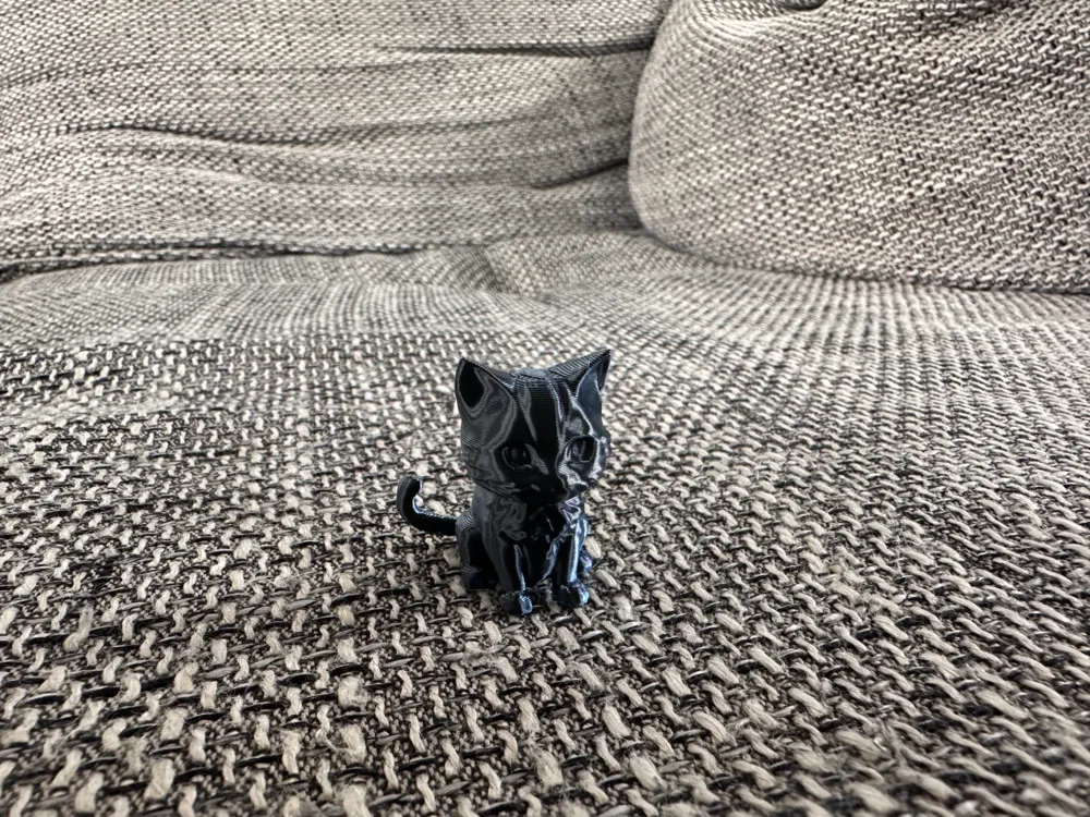 Cute cat 3D model and keychain by 3Dcrabi - MakerWorld