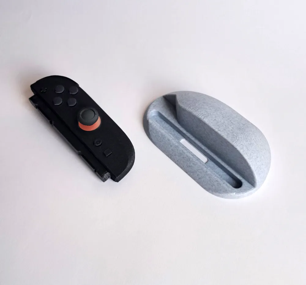 V1 LARGER Switch 2 Joycon Mouse Grip Adaptor Base by MrFoxMakes MakerWorld: Download Free 3D Models