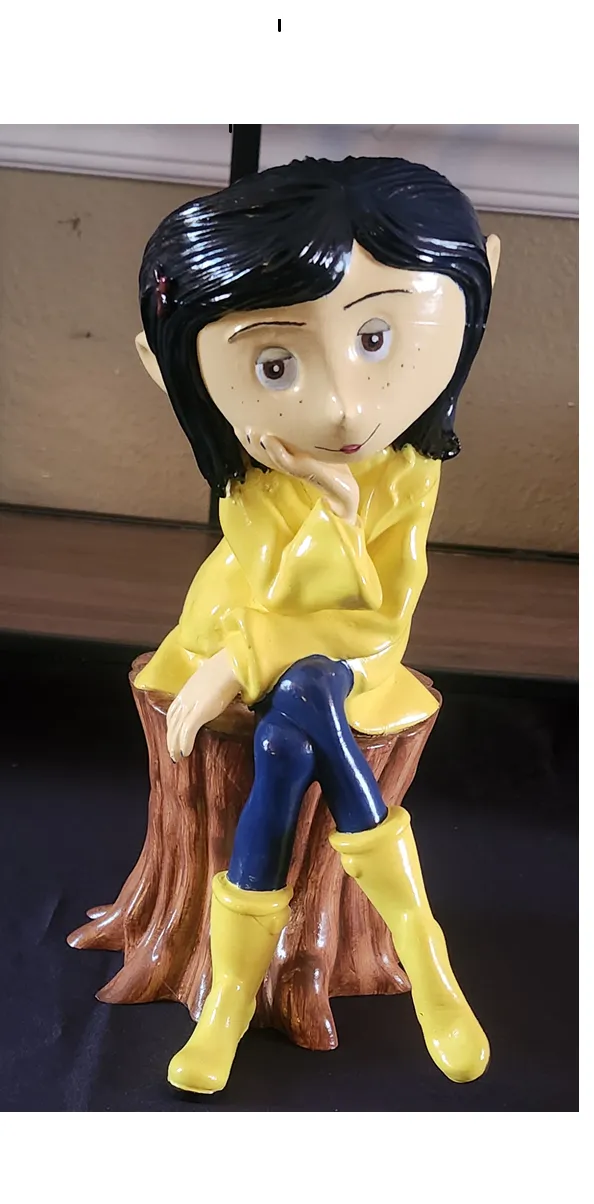 Coraline-Inspired Raincoat Girl Figurine - Free 3D Print Model - MakerWorld