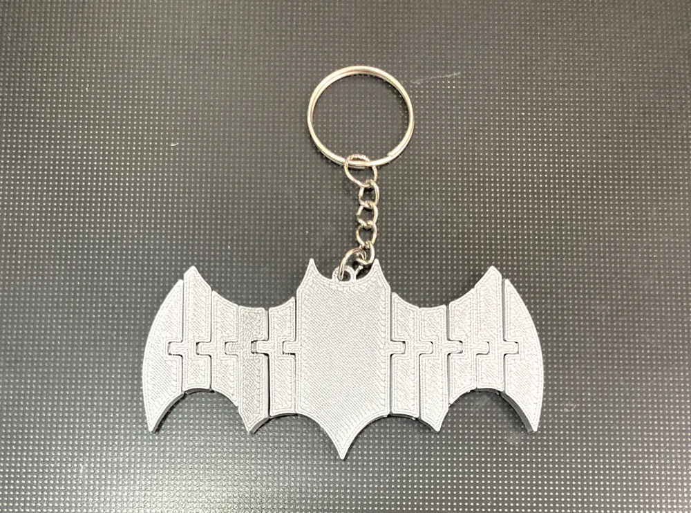 Articulated bat keychain - Free 3D Print Model - MakerWorld