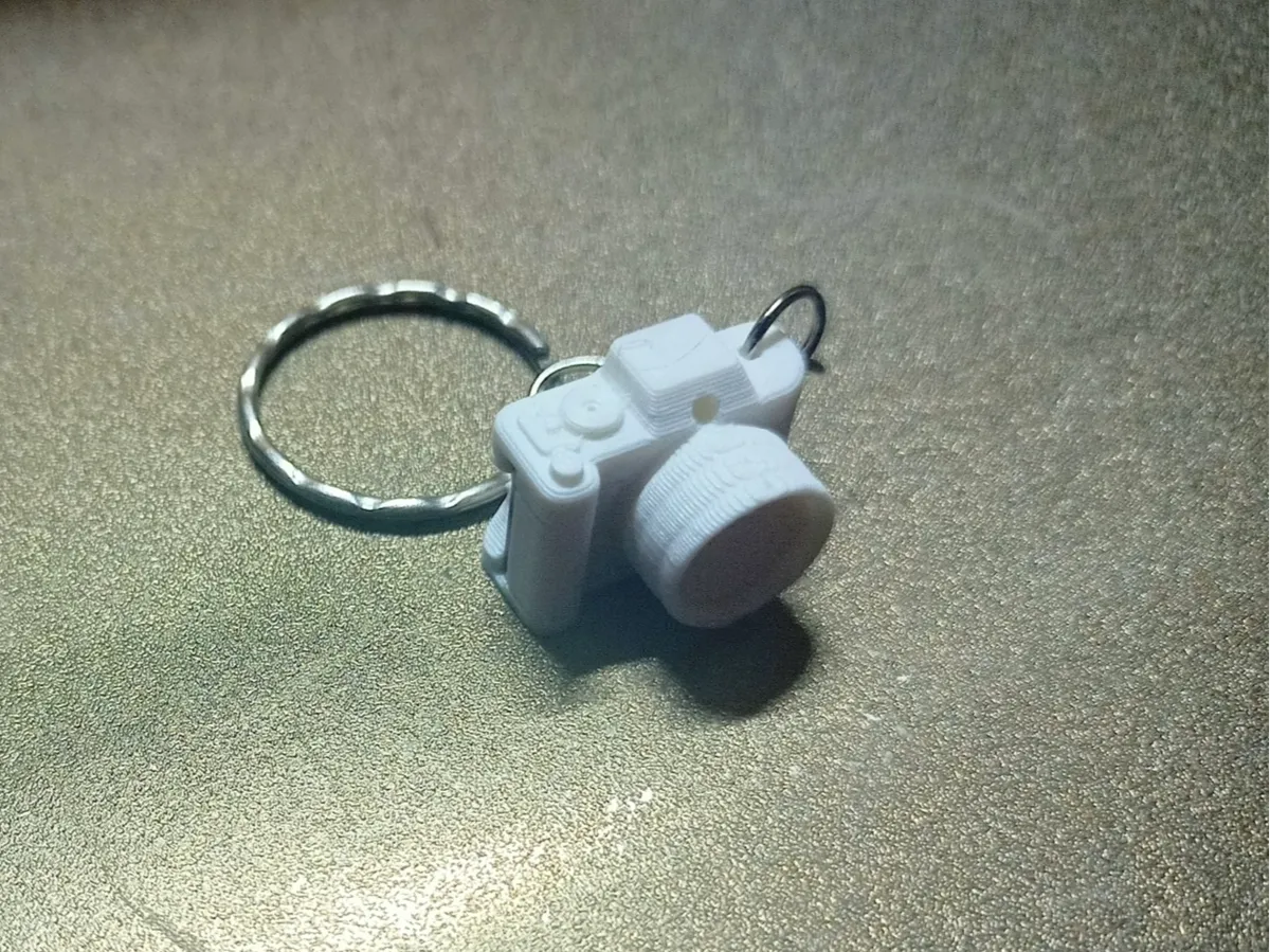 Camera Keychain / MicroSD Card Holder - Free 3D Print Model - MakerWorld