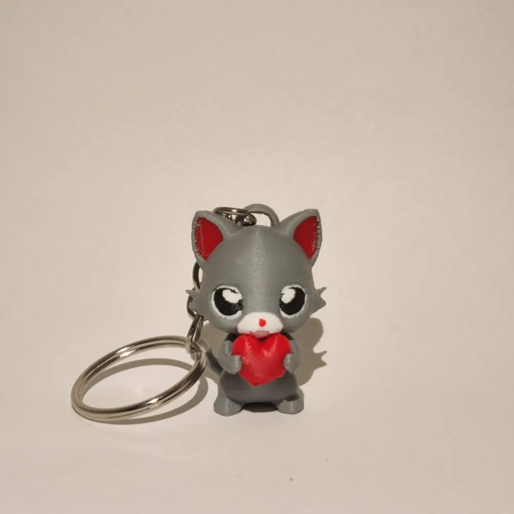 Cute animals holding hearts keychains by Below3D MakerWorld: Download Free 3D Models