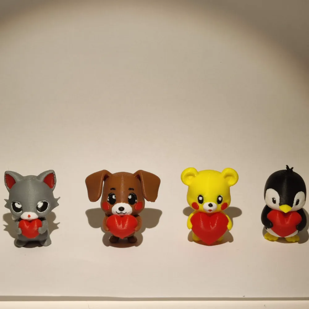 Cute animals holding hearts keychains - Free 3D Print Model - MakerWorld