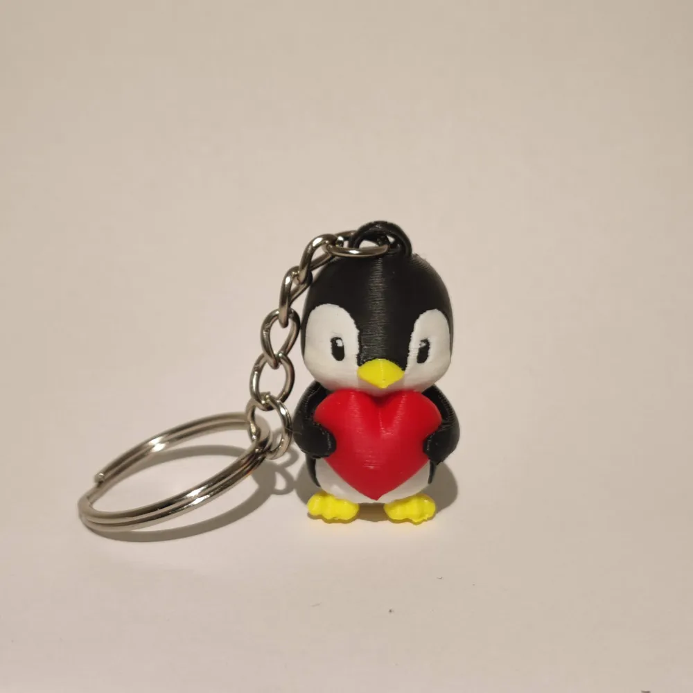 Cute animals holding hearts keychains - Free 3D Print Model - MakerWorld