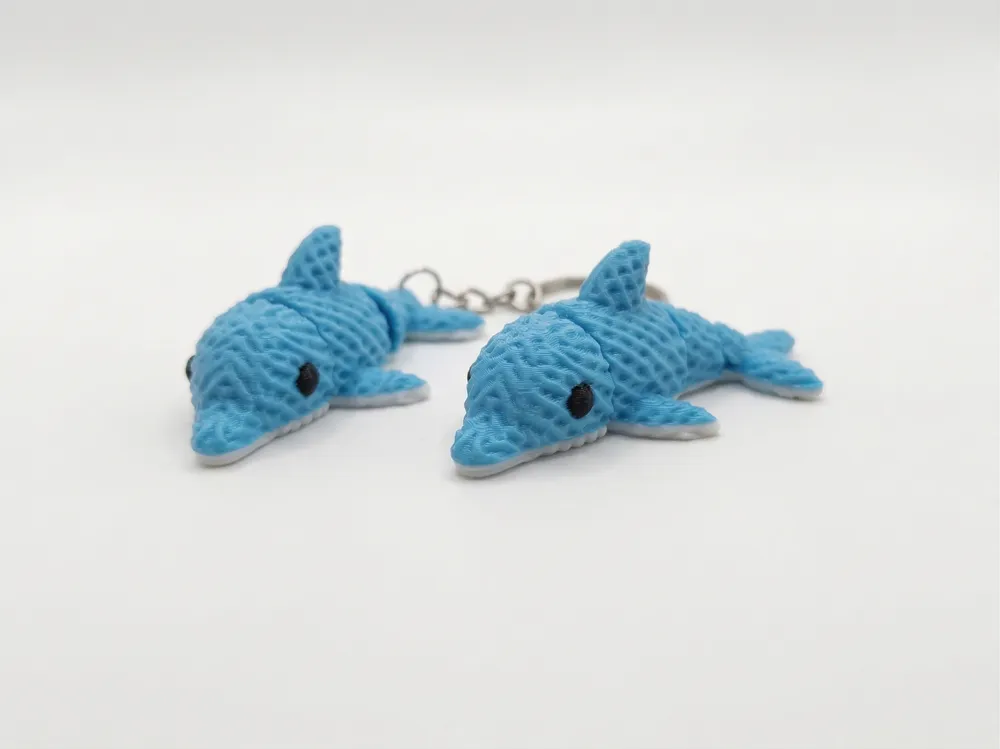 Mini knitted flexi dolphin + keychain - Free 3D Print Model - MakerWorld