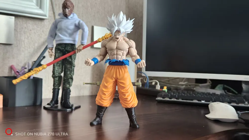 Goku - Powering Up Pose (Multi-part) - Free 3D Print Model - MakerWorld