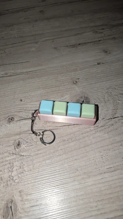 Fidget Keyboard Keyring. - Free 3D Print Model - MakerWorld