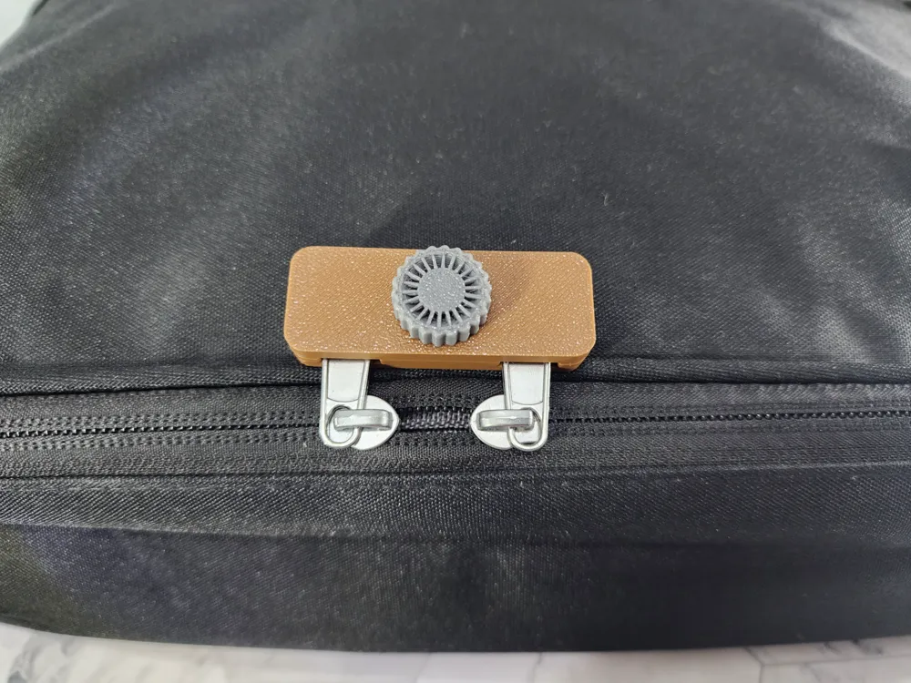 Backpack tamper lock by TriDee Design MakerWorld: Download Free 3D Models