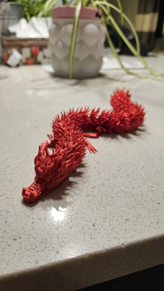 Articulated Flamy dragon - Free 3D Print Model - MakerWorld