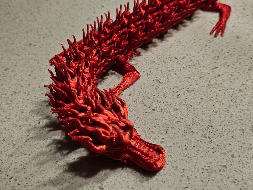 Articulated Flamy dragon by Tommy Gun MakerWorld: Download Free 3D Models