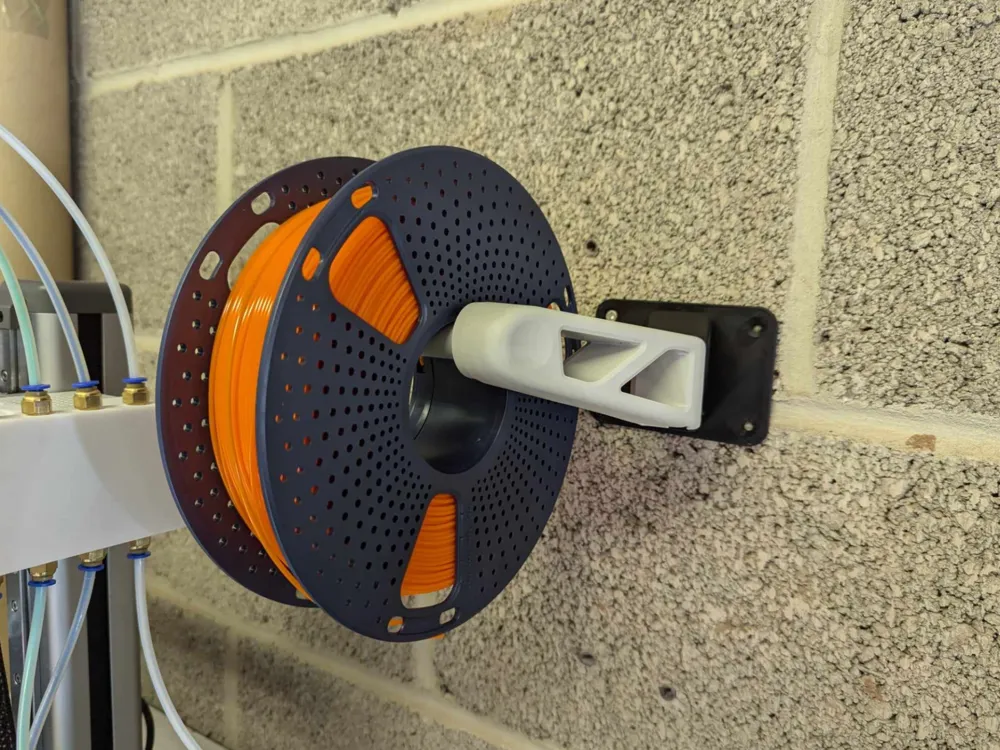 A1 mini wall mounted filament holder by Mohawk-Makes - MakerWorld