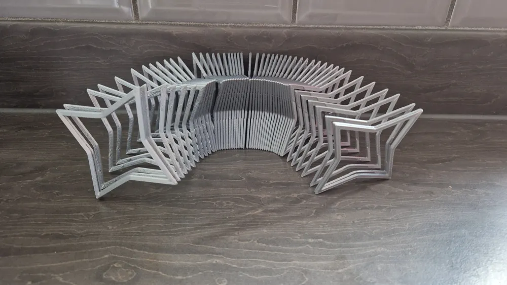Slinky Spring Star by Chrobakx - MakerWorld
