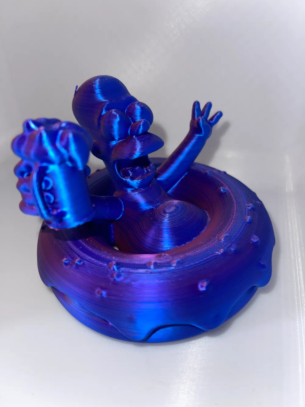 Homer Simpson floats in his donut, drinks a beer by Neoflix3d - MakerWorld