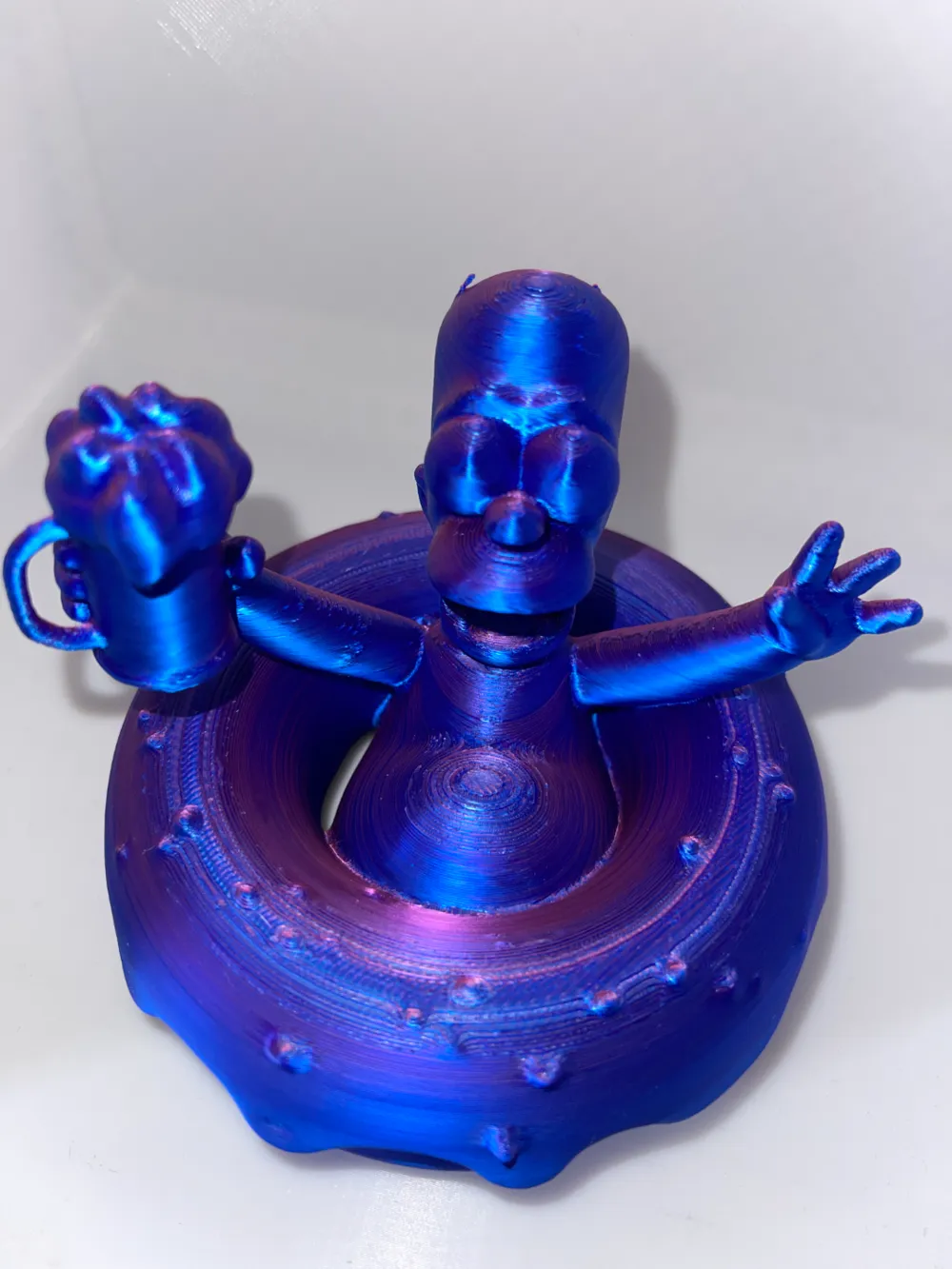 Homer Simpson floats in his donut, drinks a beer by Neoflix3d - MakerWorld