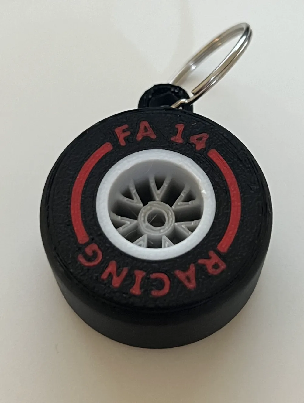 F1 Fernando Alonso wheel keychain by jorgegalindo94 - MakerWorld