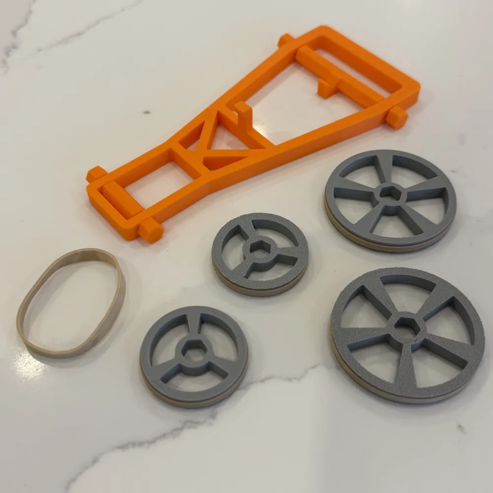 Rubber Band Car - Axles Printed in Place - Free 3D Print Model - MakerWorld