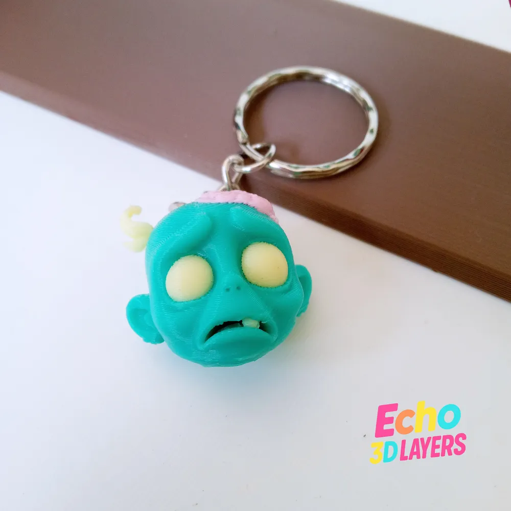 Zombie head keychain by Echo 3D Layers MakerWorld: Download Free 3D Models