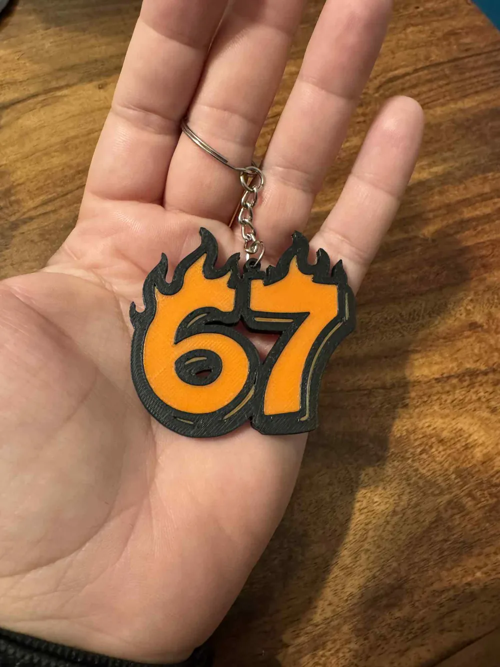 Flaming 67 keychain - Free 3D Print Model - MakerWorld