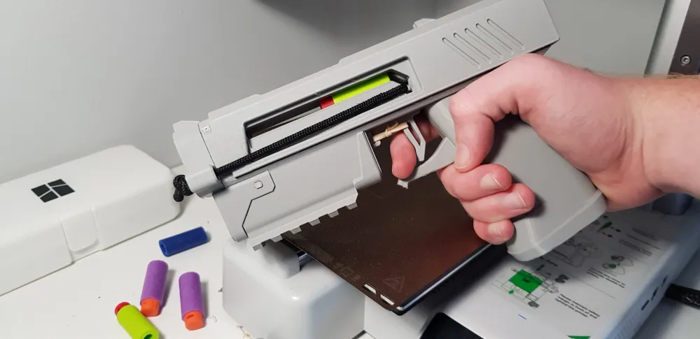 Skal Pistol: Nerf Shell-Fed Stringer - Free 3D Print Model - MakerWorld