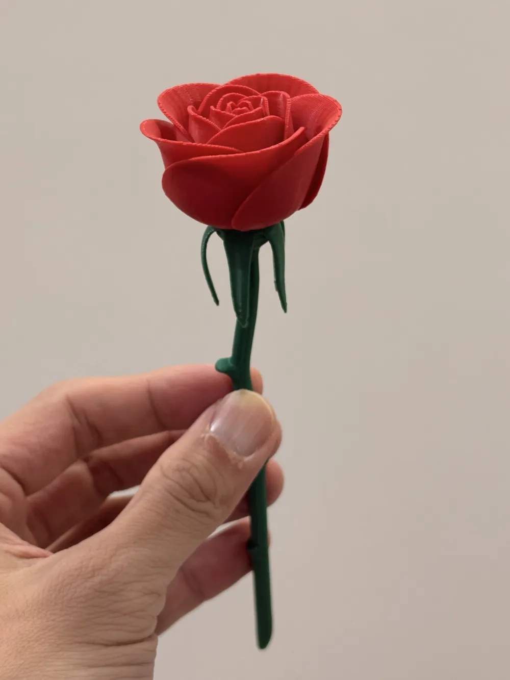 Rose in Hand ( No AMS required) - Free 3D Print Model - MakerWorld