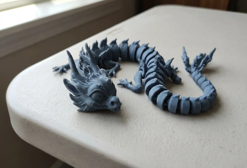 Print in place articulated dragon - Free 3D Print Model - MakerWorld