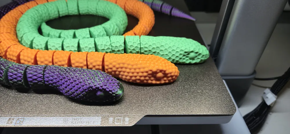 three articulated textured snakes - Free 3D Print Model - MakerWorld