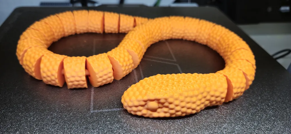 three articulated textured snakes - Free 3D Print Model - MakerWorld