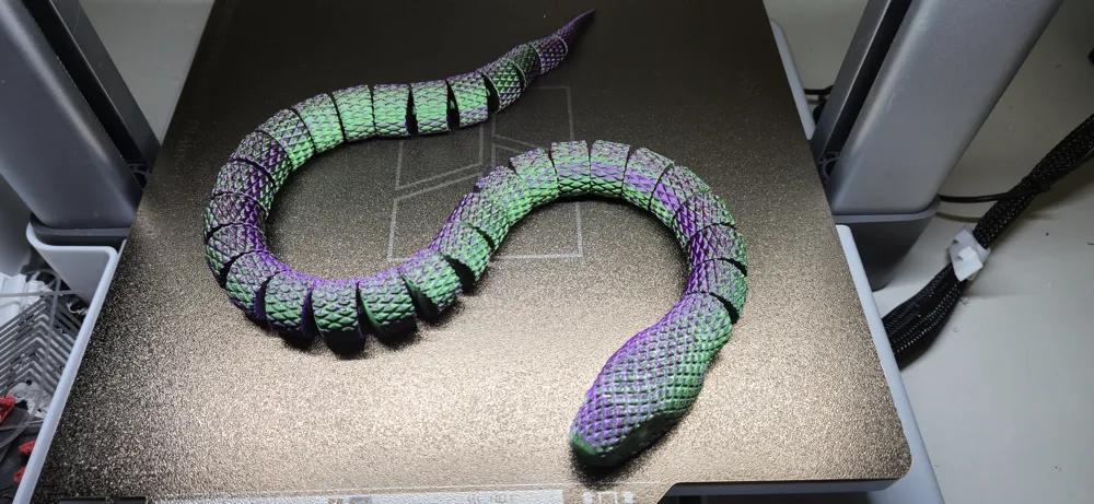three articulated textured snakes - Free 3D Print Model - MakerWorld