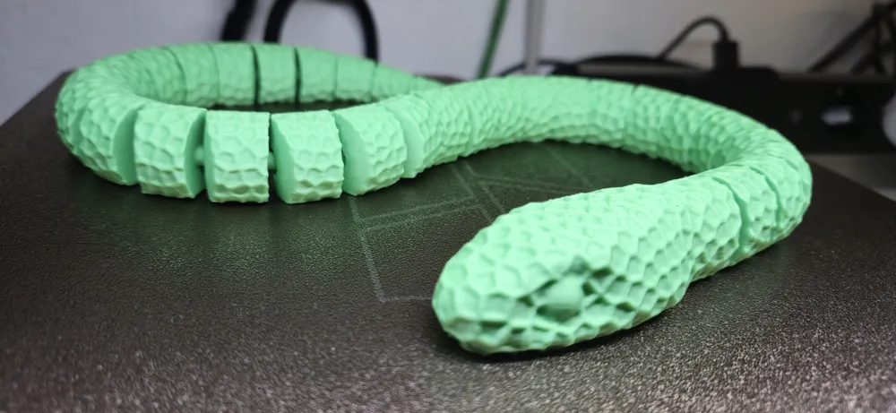 three articulated textured snakes Remixed by Blubbmann MakerWorld ...