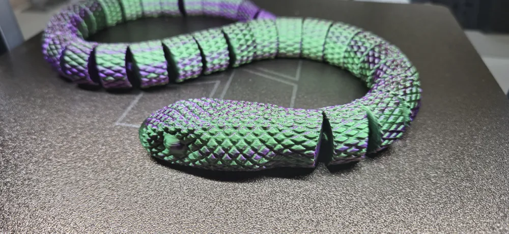 three articulated textured snakes - Free 3D Print Model - MakerWorld