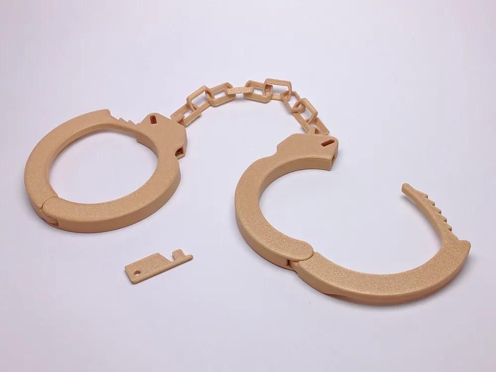 Toy Handcuffs with Key (print-in-place) by LoboCNC MakerWorld: Download ...