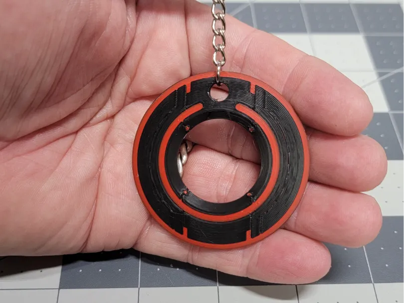 Tron Identity Disc keychain - Free 3D Print Model - MakerWorld