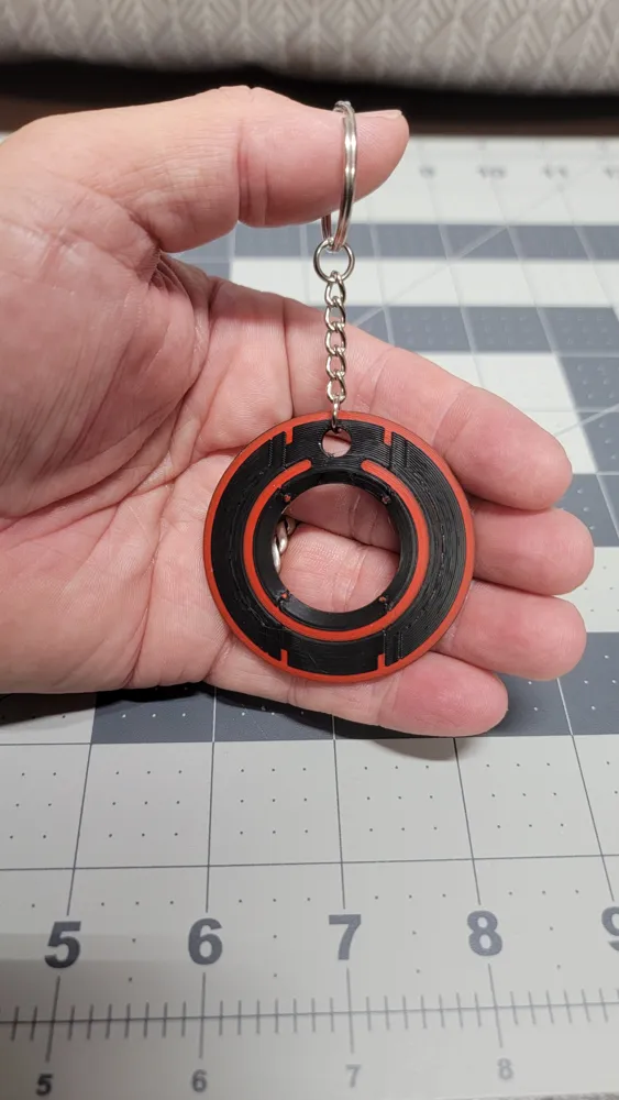 Tron Identity Disc keychain - Free 3D Print Model - MakerWorld