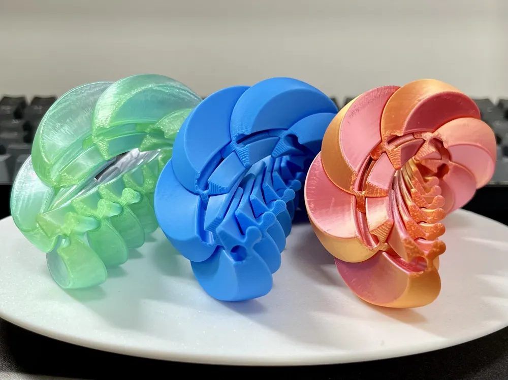 Twisty Fidget Ball_12-segment-Easy Print - Free 3D Print Model - MakerWorld
