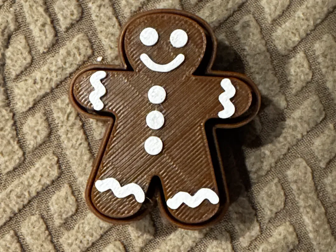 Gingerbreadman fidget clicker - Free 3D Print Model - MakerWorld