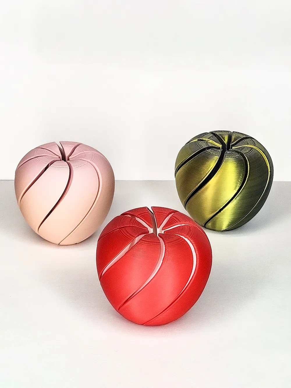 SpiralTwist Apple Fidget - Free 3D Print Model - MakerWorld