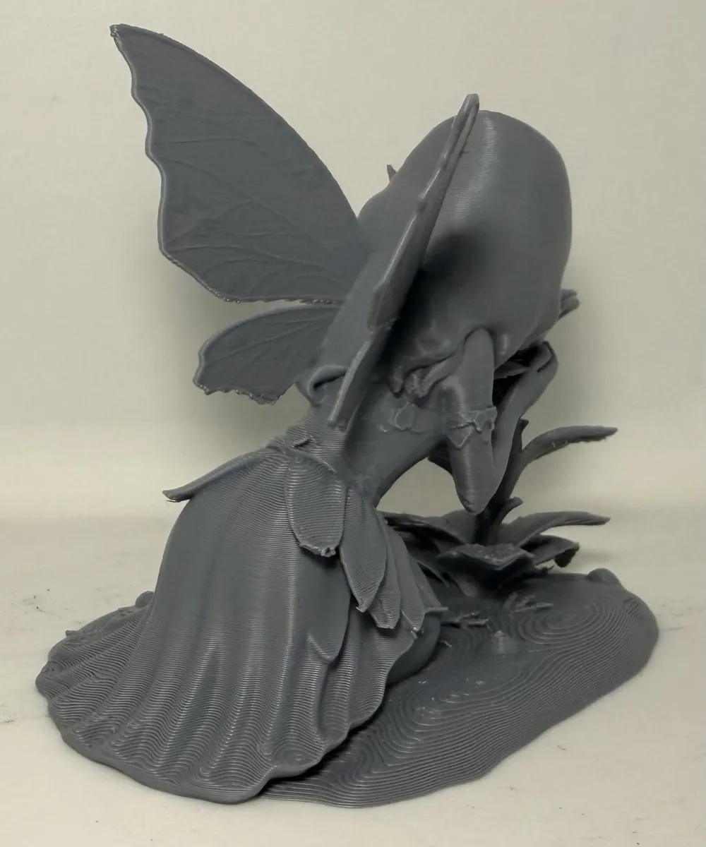 Garden Fairy Smelling a Flower - Free 3D Print Model - MakerWorld