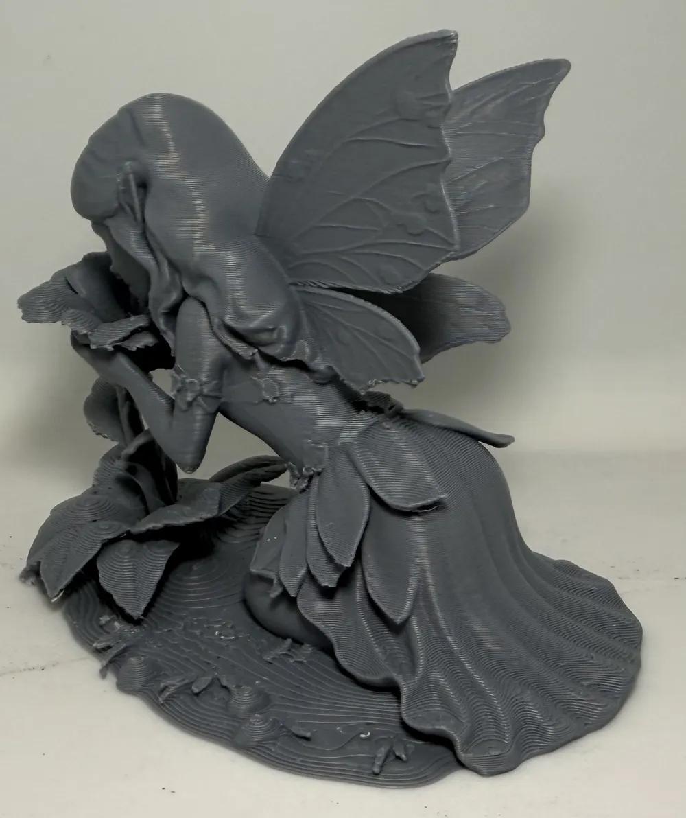 Garden Fairy Smelling a Flower - Free 3D Print Model - MakerWorld