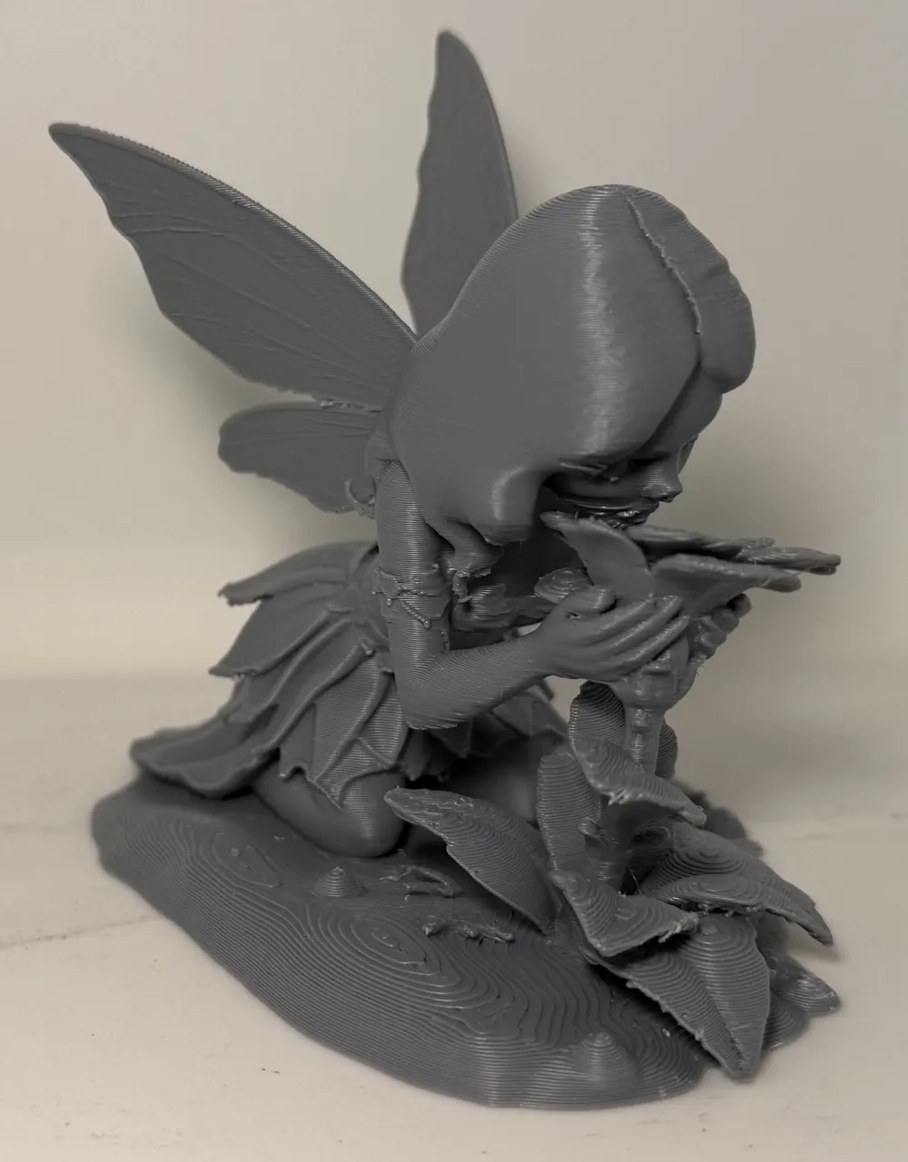 Garden Fairy Smelling a Flower - Free 3D Print Model - MakerWorld