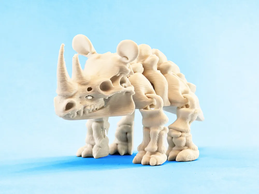 Articulated skeleton rhino dinosaur - Free 3D Print Model - MakerWorld