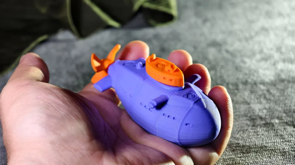 A charming chibi submarine, buoyant and powered by rubber bands ...