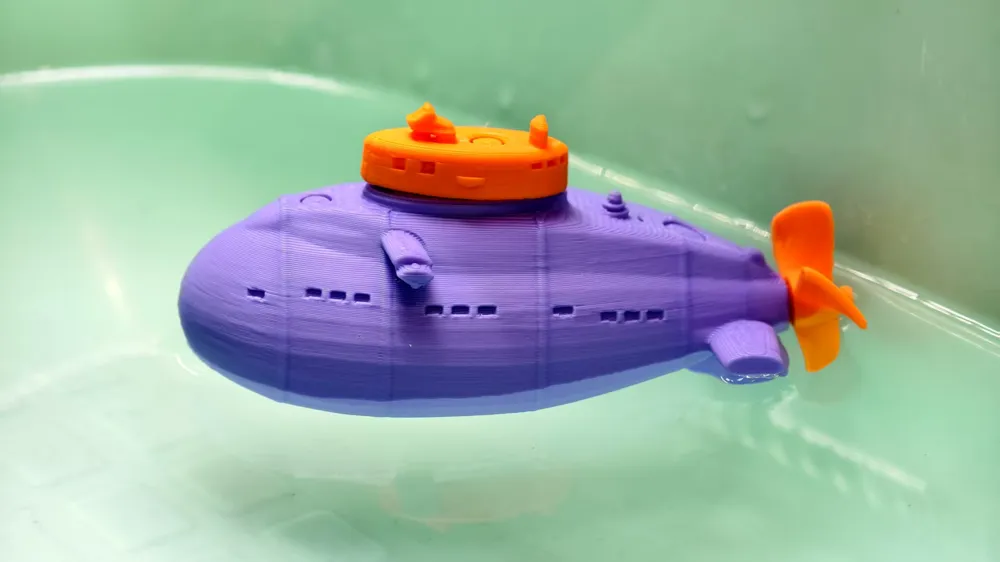 A charming chibi submarine, buoyant and powered by rubber bands ...