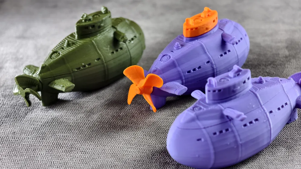 A charming chibi submarine, buoyant and powered by rubber bands ...