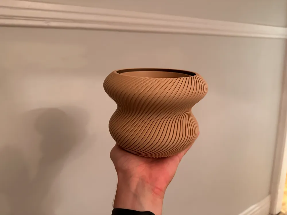 Curved Flower Pot by FelixL MakerWorld: Download Free 3D Models