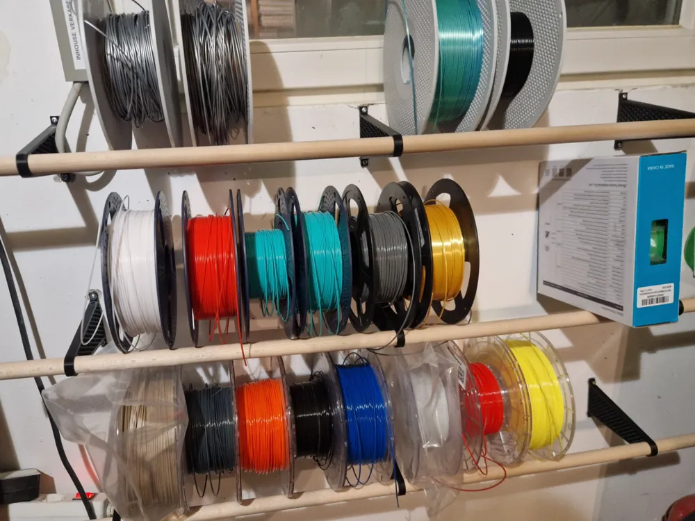 Filament wall rack by The answer is 42 - MakerWorld