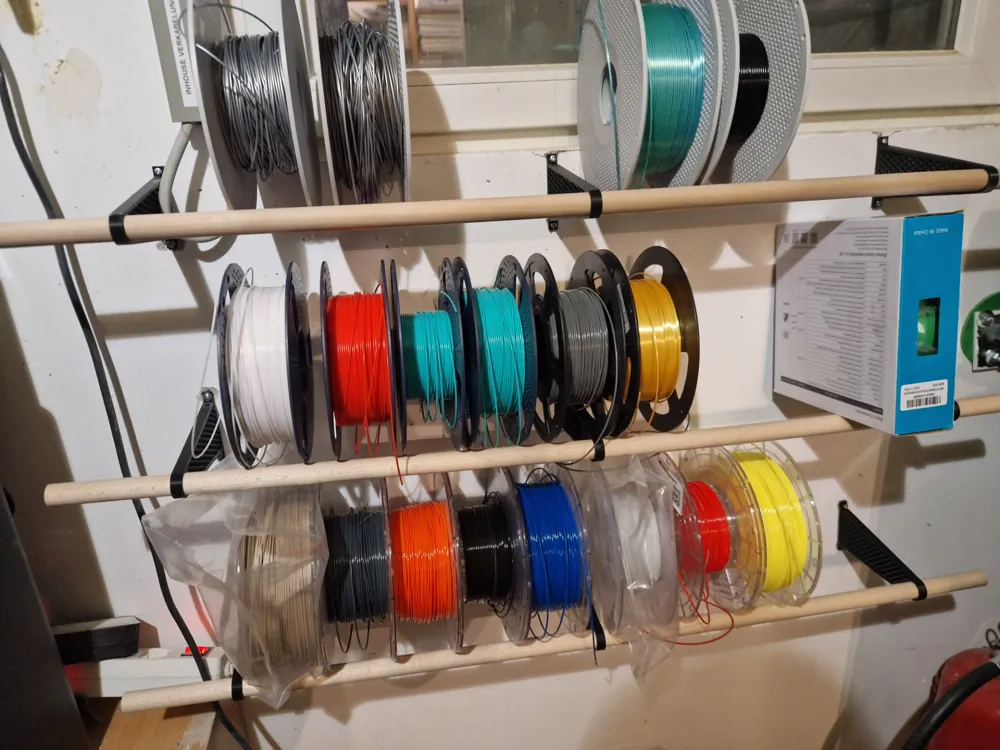 Filament wall rack by The answer is 42 - MakerWorld