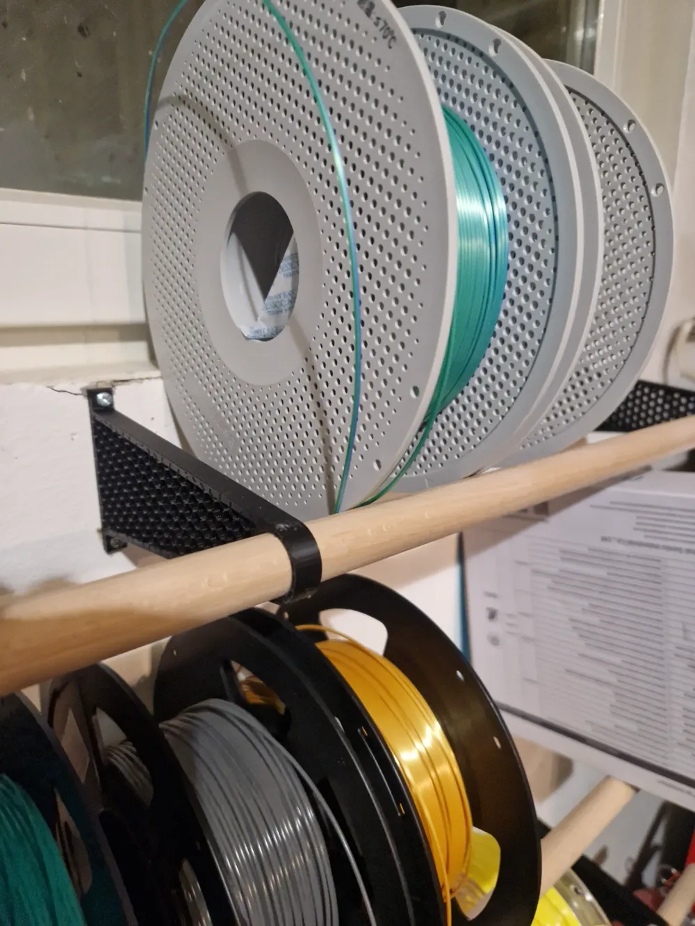 Filament wall rack by The answer is 42 - MakerWorld