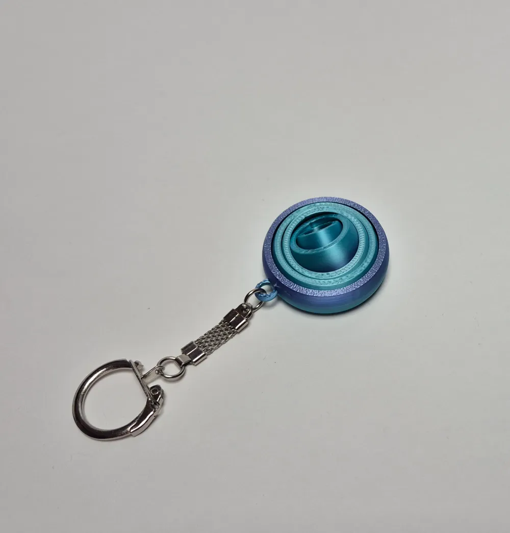 Gyro fidget for keychain by LangHjornArt - MakerWorld